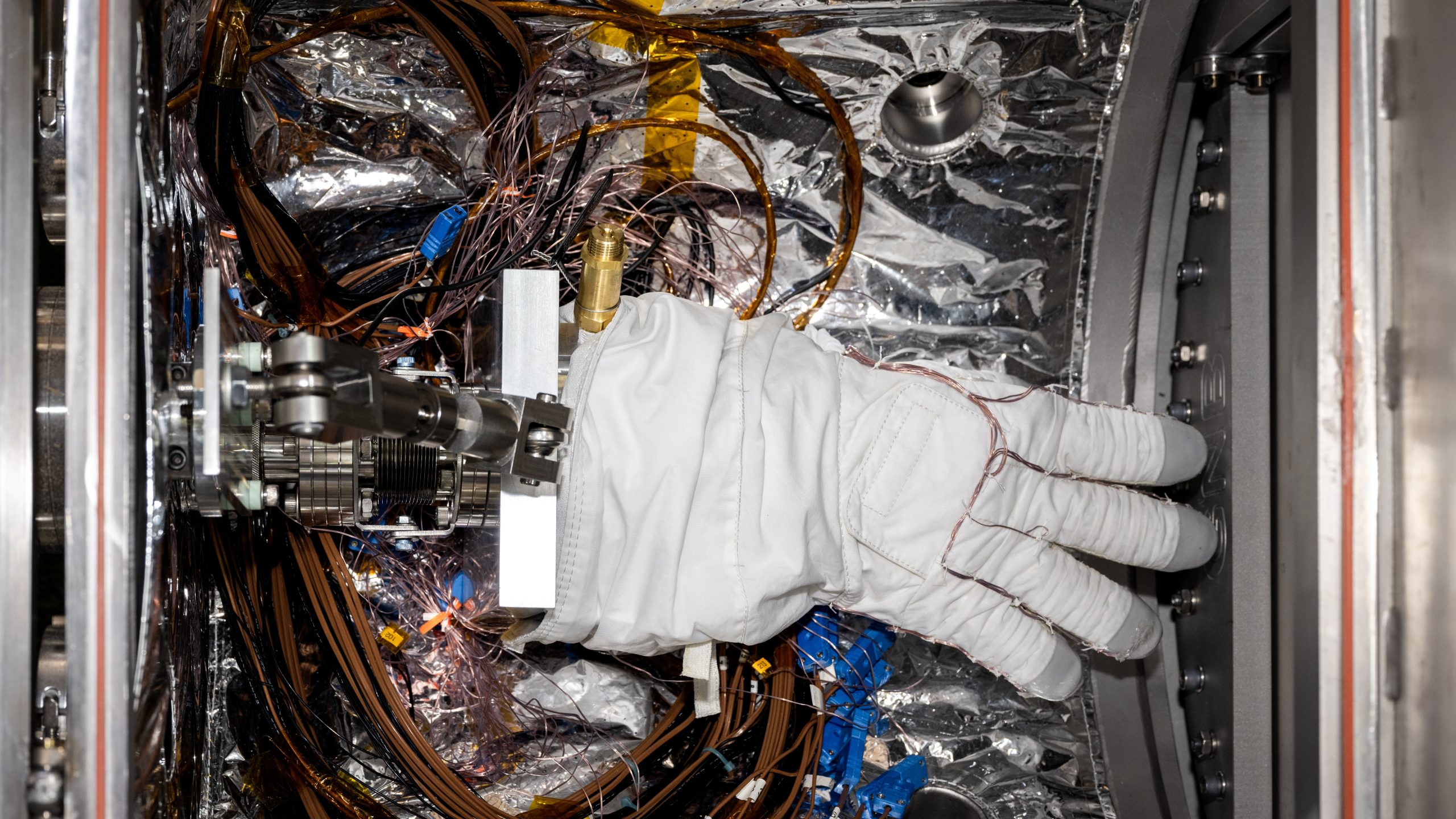 NASA Tests Key Spacesuit Parts Inside This Icy Chamber - Space Launch ...
