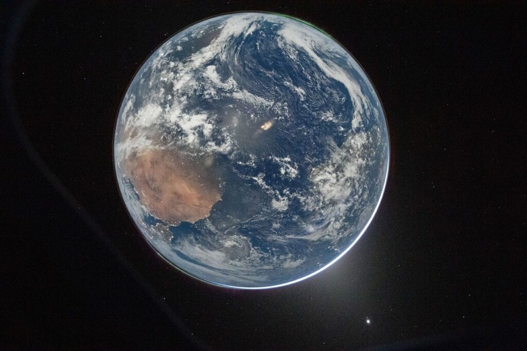 A Moonlit Earth as Seen From Artemis II - Space Launch Schedule
